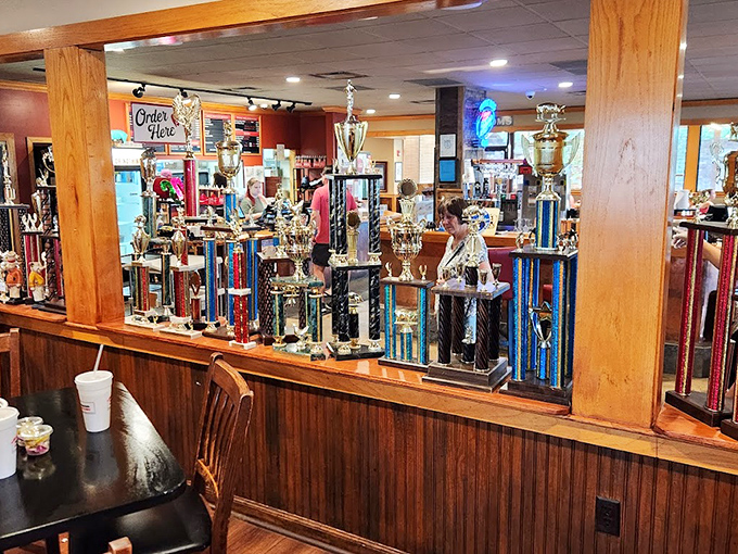 Not just decoration&mdash;each trophy represents a barbecue battle won, a testament to smoke mastery that you can taste in every bite.