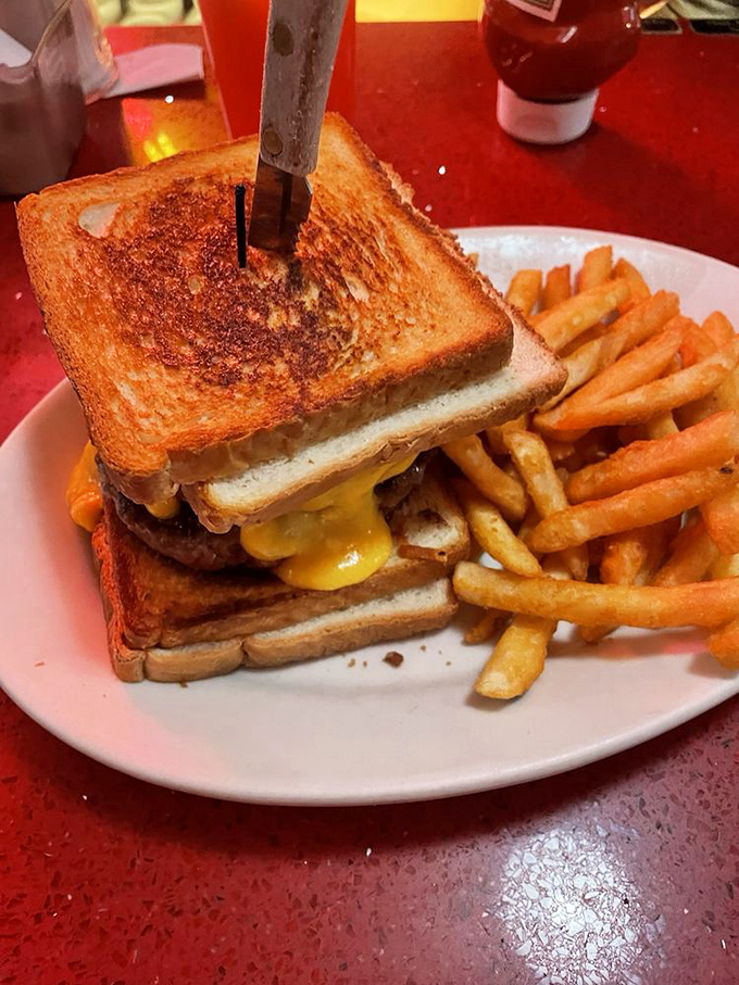 This isn't just a grilled cheese sandwich&mdash;it's a masterclass in butter-crisped perfection with molten American cheese threatening joyful escape.