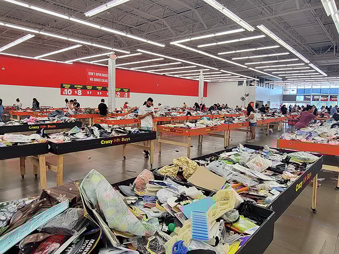 The sea of merchandise stretches to the horizon, with shoppers navigating the waves of deals like seasoned sailors.