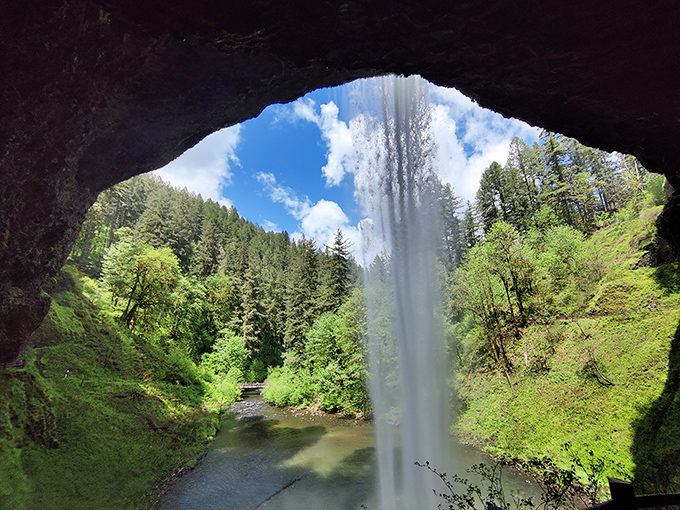 Standing behind the falls offers nature's ultimate shower view &ndash; a watery skylight framing the forest beyond. No bathroom renovation will ever compare.