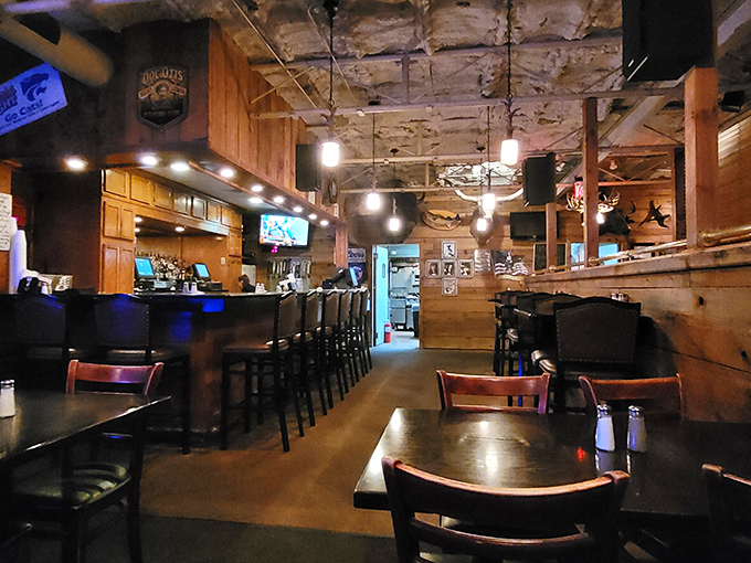 The bar area offers a cozy retreat where stories flow as freely as the drinks, and strangers quickly become friends.