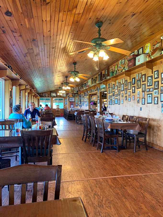 Ceiling fans lazily circulate conversation and laughter among diners, all competing for attention with that incredible view beyond the windows.