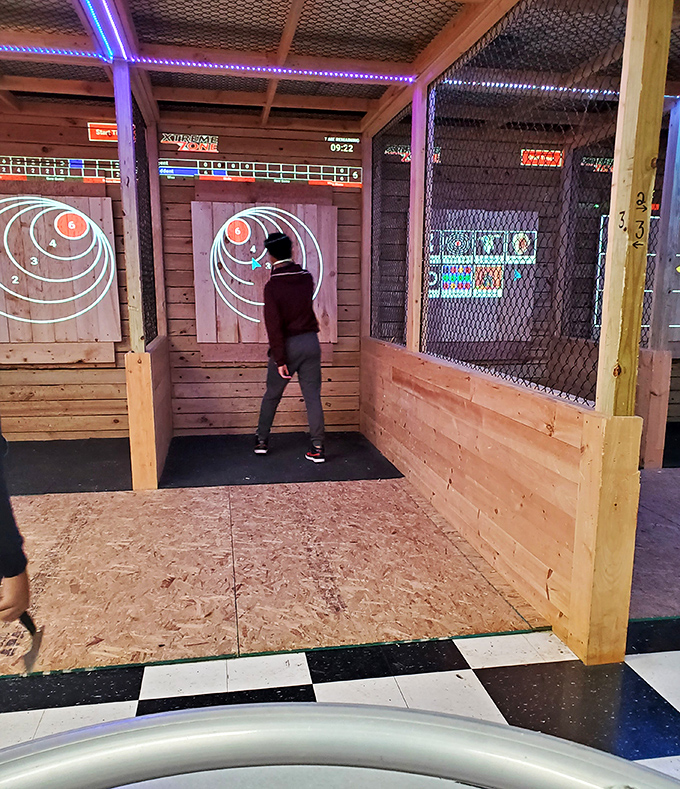 The axe-throwing area lets you channel your inner lumberjack, though with significantly better lighting and less chance of encountering an angry moose.