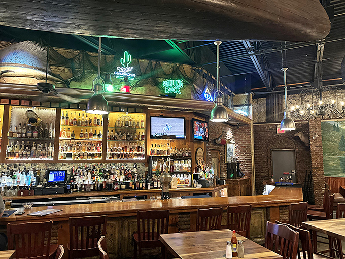 The bourbon bar's backdrop looks like the inventory of heaven itself, with enough amber bottles to make even the most discerning whiskey lover weep with joy.