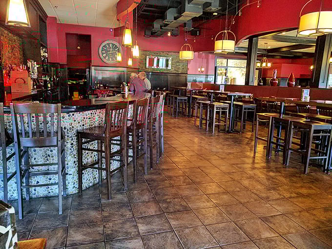 The bar area balances casual comfort with upscale touches &ndash; the perfect spot to debate whether to order another round or save room for dessert.