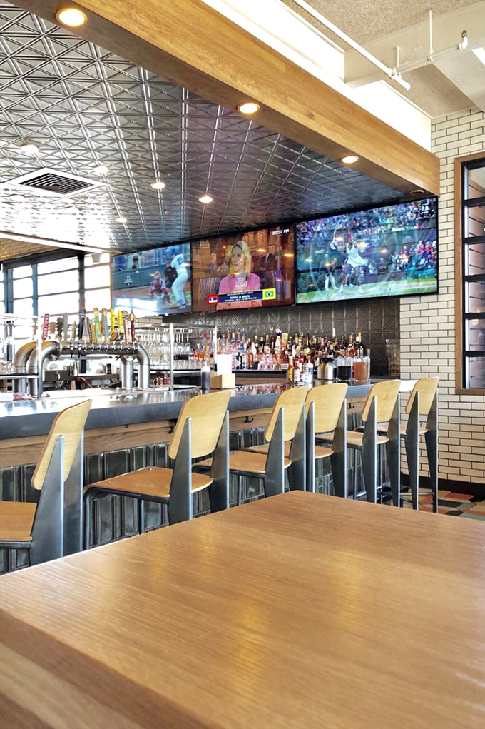 Not just a bar&mdash;a community watering hole where sports fans and cocktail enthusiasts find common ground. Those ceiling tiles have heard every Lakers debate since installation.
