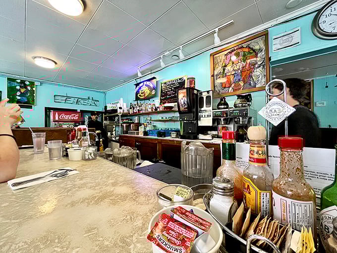 The counter view: where regulars perch, coffee is poured without asking, and breakfast magic happens behind the scenes.