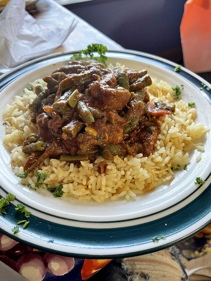 This beef and vegetable medley over rice isn't just comfort food&mdash;it's a warm hug on a plate that speaks a universal language. 