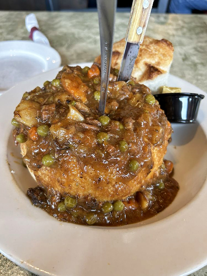 This isn't just beef stew—it's a heartwarming biography in a bread bowl, telling stories of slow-simmered afternoons and grandmothers who knew what mattered.