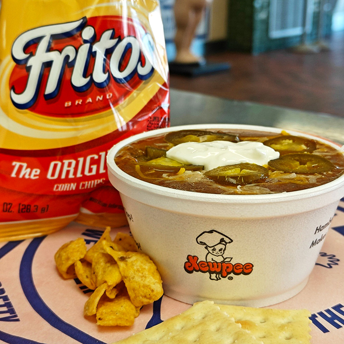 Kewpee's chili comes with an unspoken challenge: try not to dunk those Fritos directly into the cup while nobody's looking.
