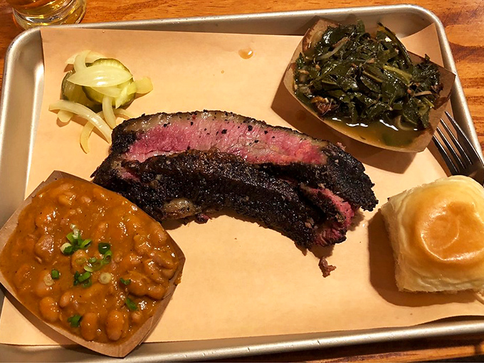 The barbecue tray that launched a thousand road trips. Those beans and greens aren't just sides – they're essential supporting characters.
