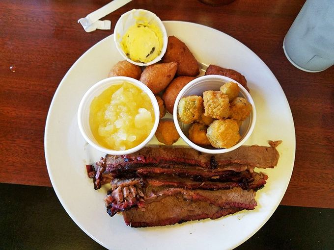 This brisket plate isn't just a meal, it's a meditation&mdash;each bite a reminder that patience (12 hours of smoking) is indeed a virtue.