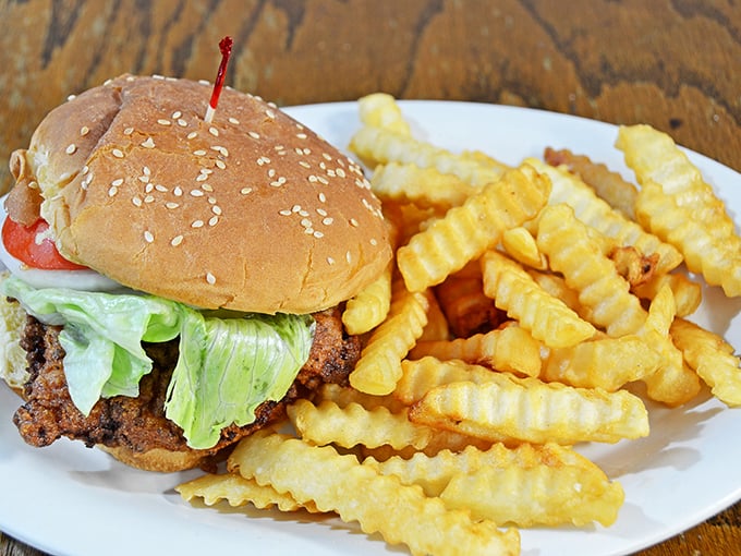 The burger that launches a thousand napkins. Those crinkle-cut fries have that magical balance of crisp exterior and fluffy interior.