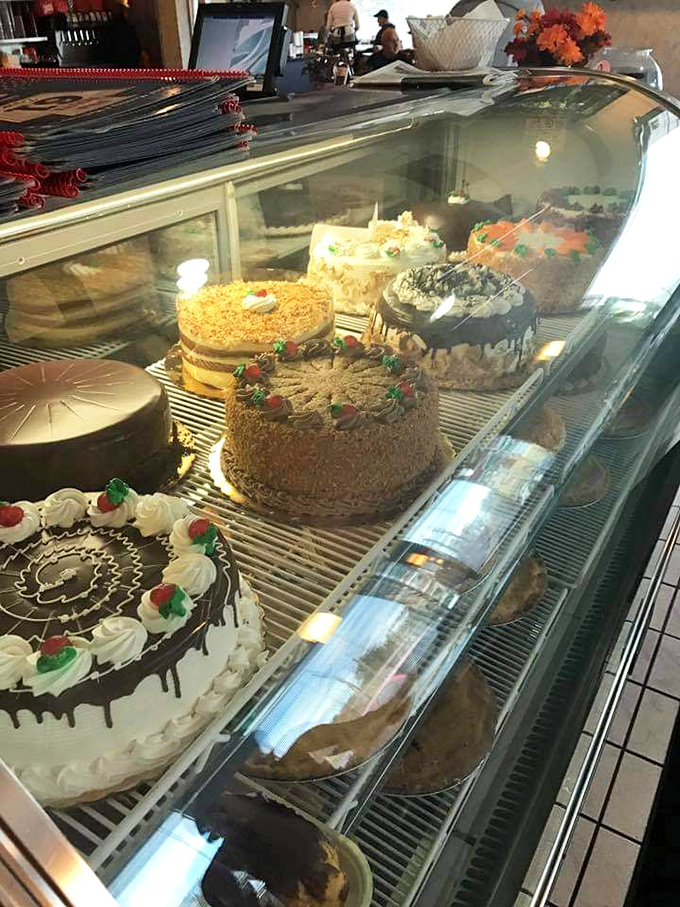 That cake display isn't just dessert&mdash;it's edible architecture, a museum of sweetness where every slice is a masterpiece waiting to happen. 