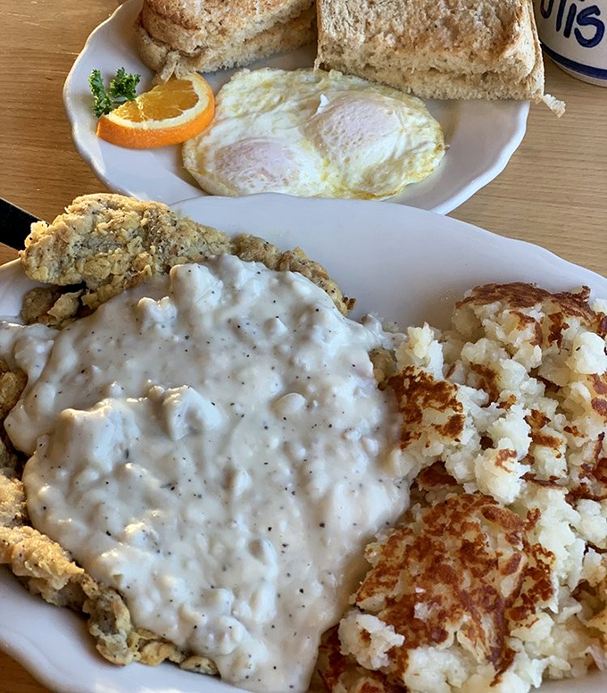 A mountain of savory hash topped with a perfect sunny-side-up egg &ndash; the breakfast equivalent of planting your flag at the summit of Delicious Mountain. 