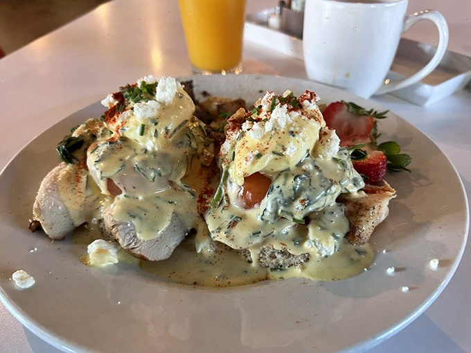 Benedict elevated beyond recognition. When hollandaise sauce cascades like a buttery waterfall, you know you've hit the breakfast jackpot.