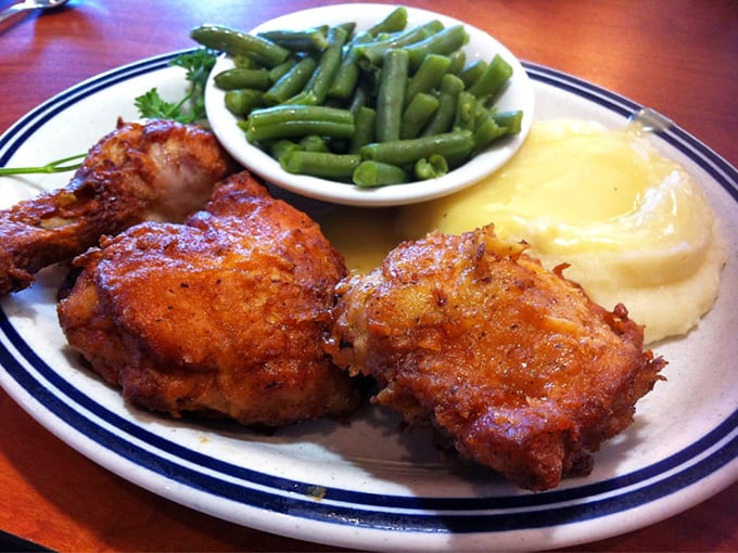 Crispy chicken meets vibrant green beans and golden mashed potatoes. A plate that proves "balanced diet" can be deliciously literal.