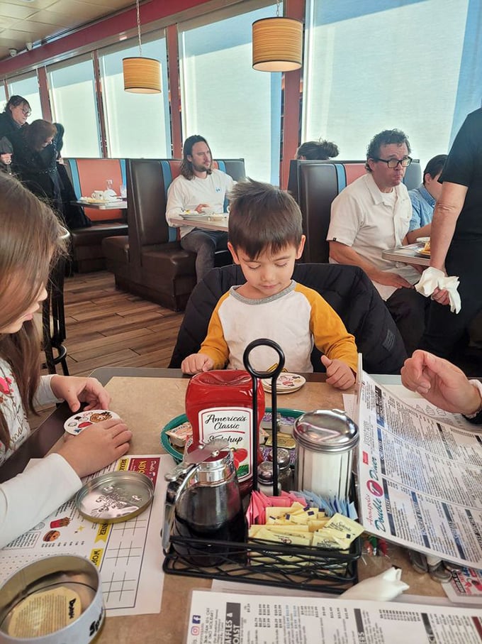 Three generations around one table&mdash;the universal language of diner breakfasts. That condiment caddy has witnessed countless family stories and syrup negotiations.