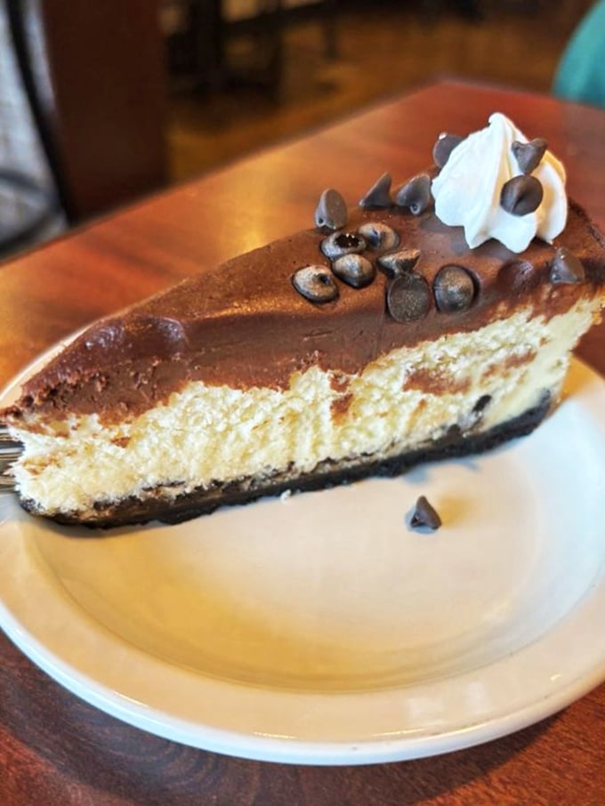 This chocolate-topped masterpiece with chocolate chip accents isn't just cheesecake&mdash;it's what other desserts aspire to be when they grow up.