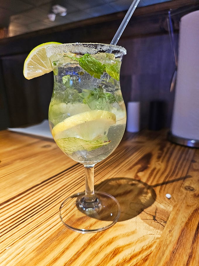 A refreshing mojito with mint and lime&mdash;the perfect palate cleanser between bites of spicy seafood. Vacation in a glass, Indiana-style.