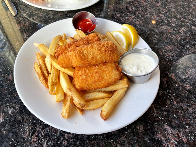 Fish and chips reinvented! Golden cod fillets that crunch like autumn leaves, paired with fries that deserve their own fan club.