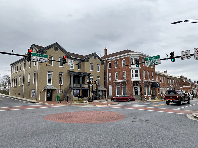 This corner has witnessed countless hellos, goodbyes, and "did you hear abouts" &ndash; the crossroads of community in brick and mortar.