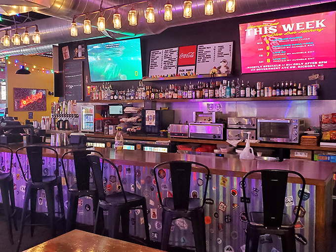 The bar's industrial-chic design features color-coded stools that guide patrons through their evening of high scores and higher spirits.