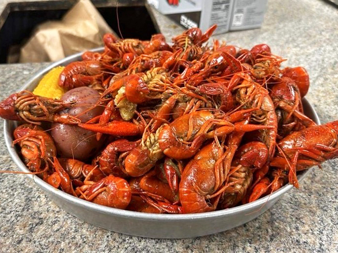Crawfish so red they look like edible rubies. This bowl of Cajun treasure is worth every messy minute it takes to eat.