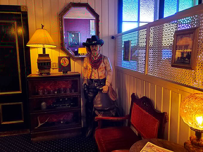 Every corner tells a story&mdash;this cowboy figure stands guard over decades of dining memories and countless satisfied appetites.