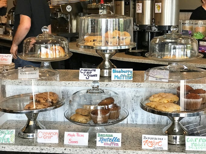 A pastry display that renders willpower completely useless. Each dome protects treasures more valuable than anything in the Louvre.