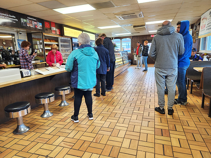 The line at Bill's isn't just people waiting—it's a community forming, united by the universal language of exceptional donuts.