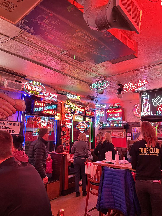 The neon glow bathes diners in a rosy light that makes everyone look like they're having the best time&mdash;because they are.