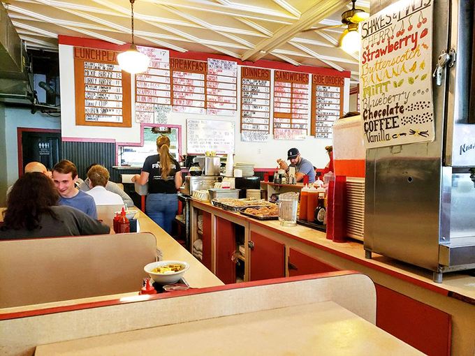 Where memories are made between bites of pancakes and sips of coffee, with menu boards overhead that have guided generations through breakfast decisions.