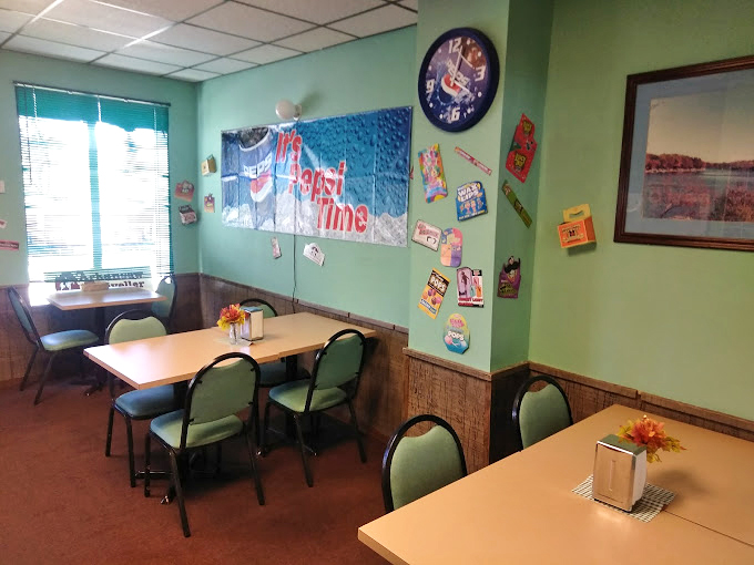 The café area offers a moment to contemplate your sugar selections before the inevitable sugar rush turns you into a human pinball.