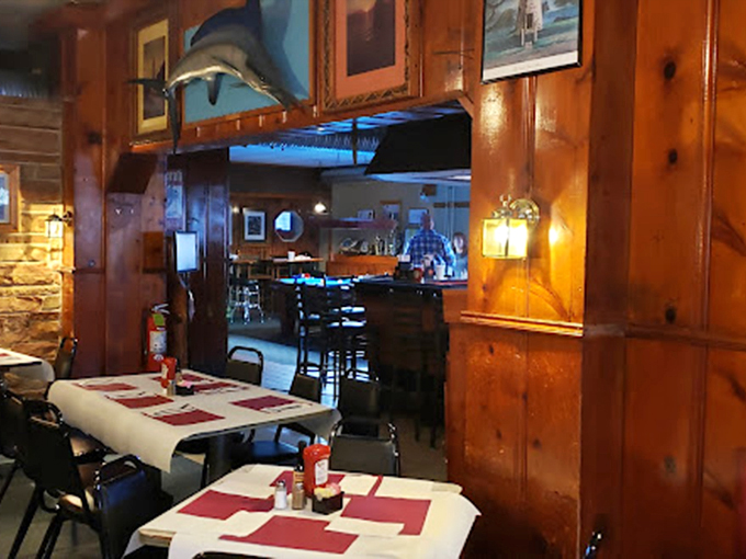 This isn't interior design&mdash;it's seafood archaeology, where every wooden panel and red placemat tells stories of meals past and crab feasts to come.
