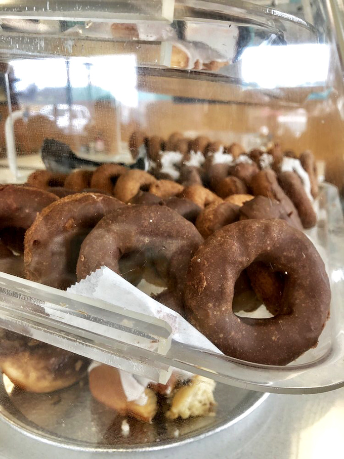 Donuts so good they should be controlled substances. These chocolate-glazed beauties have caused more Omaha traffic delays than road construction.