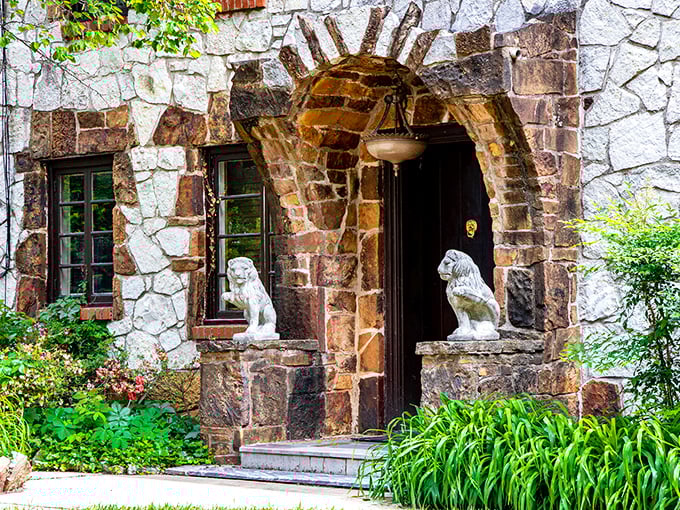 Lion sentinels guard the entrance, silently judging whether you're royalty material before you even step through the arched doorway.