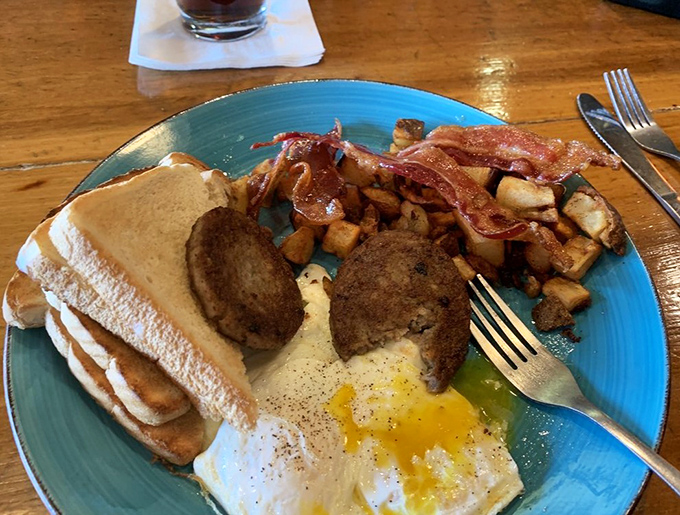 The breakfast plate that launched a thousand food comas. That runny egg yolk is nature's perfect sauce, ready to elevate everything it touches.