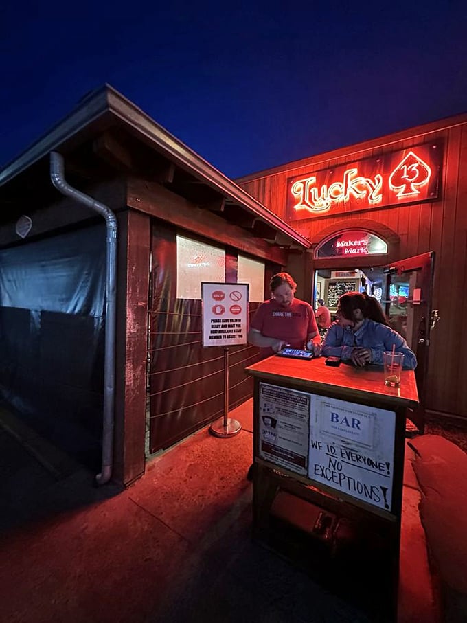 The entrance at night has all the allure of a speakeasy, if speakeasies specialized in life-changing burgers instead of gin.