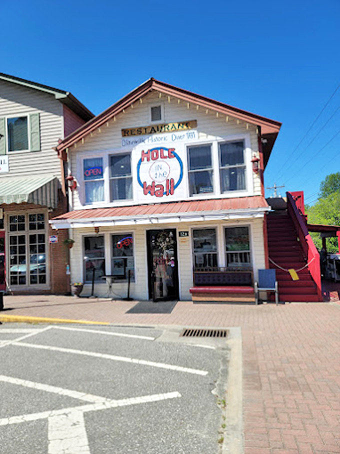 The historic diner stands like a breakfast lighthouse, guiding hungry travelers to a safe harbor of homestyle cooking.