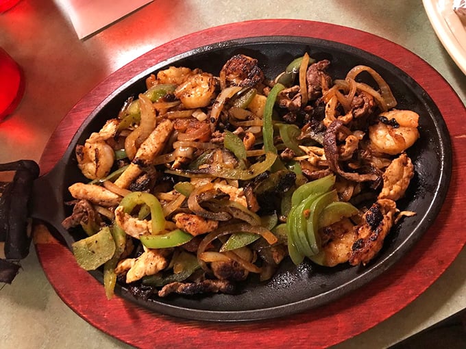 Fajitas that announce their arrival with a sizzle and a smell that turns every head in the restaurant.