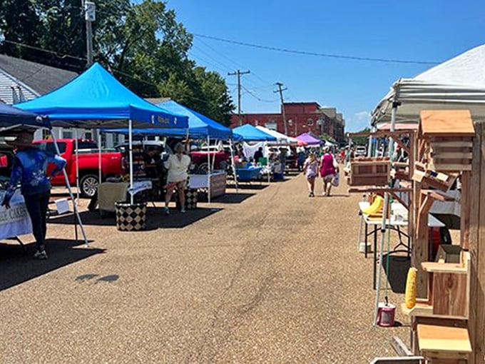 The farmers market transforms ordinary streets into a community gathering spot where local flavors and friendly faces create the real Mississippi experience.