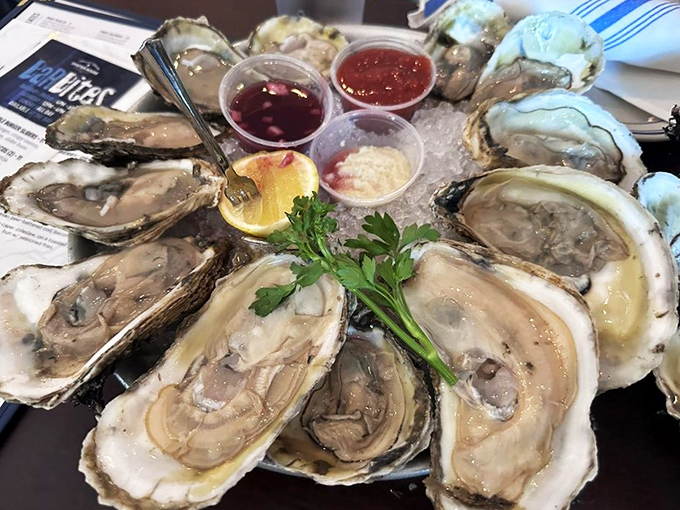 These aren't just oysters; they're a flavor geography lesson served on the half shell with three different sauces for your dipping pleasure.