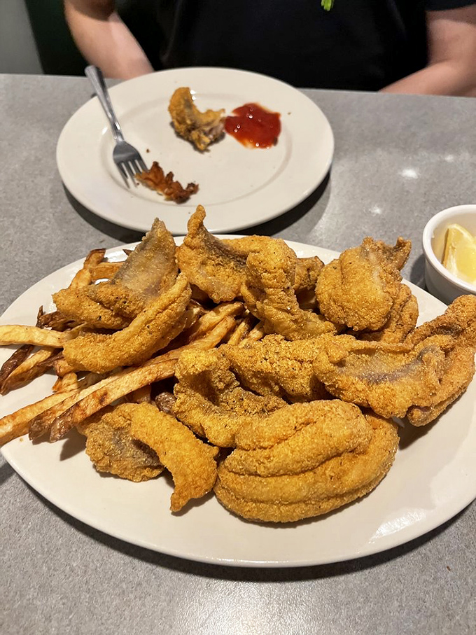 This isn't just fried fish&mdash;it's edible gold, each piece a testament to the perfection possible when simple ingredients meet time-honored technique.