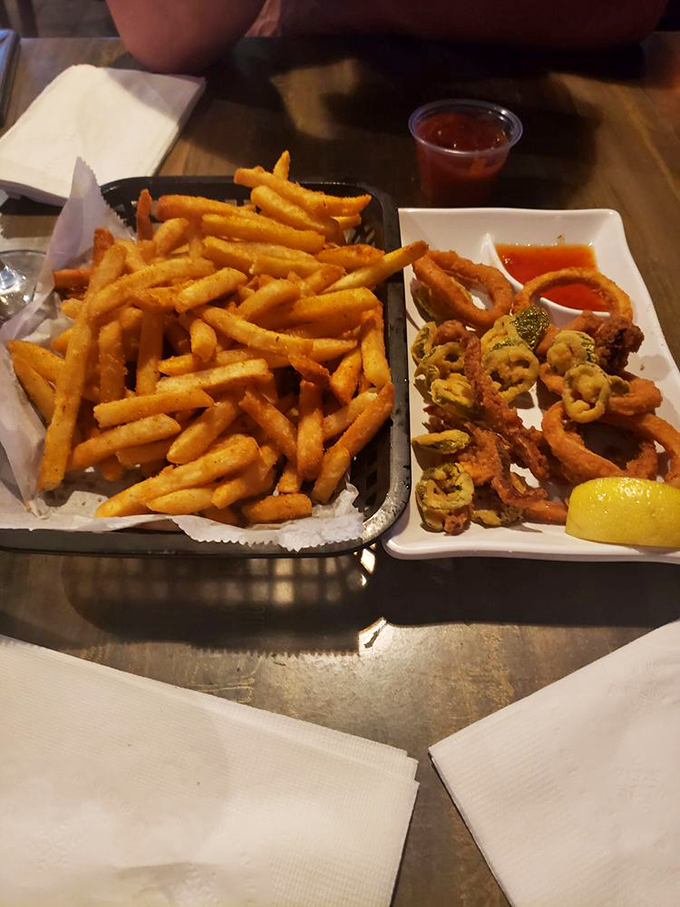 Golden fries and crispy calamari&mdash;the perfect supporting actors in your seafood drama, ready for their dipping sauce co-stars.