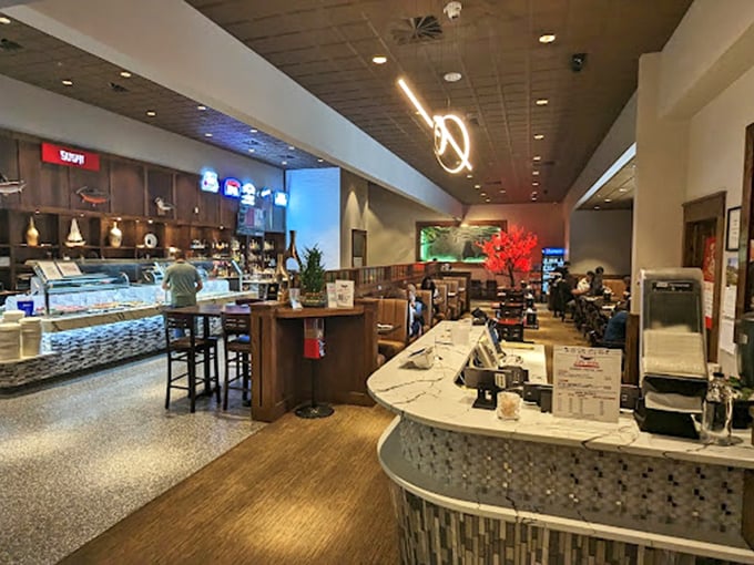Sleek, modern design elements create an upscale atmosphere that elevates the buffet experience far beyond its humble "all-you-can-eat" origins.