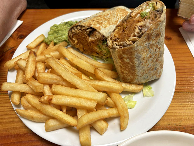 The bar area combines function with festive charm &ndash; a staging ground for the margaritas that pair perfectly with their menu.