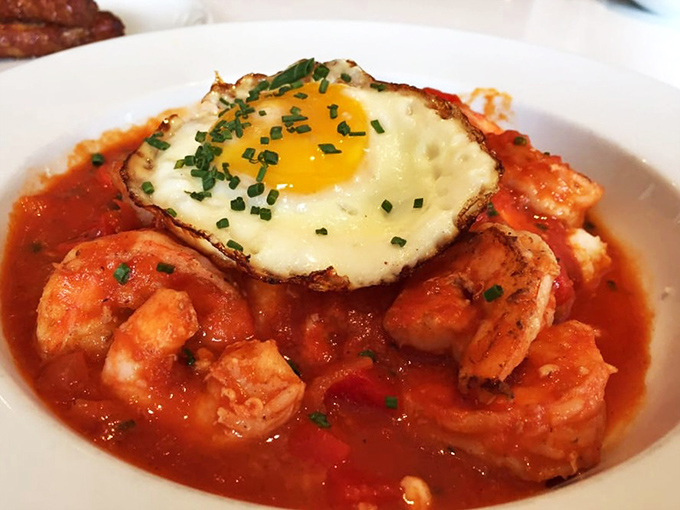 The dish that made Wisconsin fall in love with grits. Those plump shrimp swimming in tomato sauce are like little flavor lifeguards.