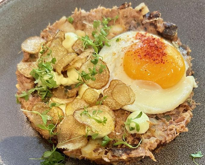 This isn't just breakfast hash&mdash;it's morning poetry with a perfectly fried egg performing as the sonnet's crowning glory.