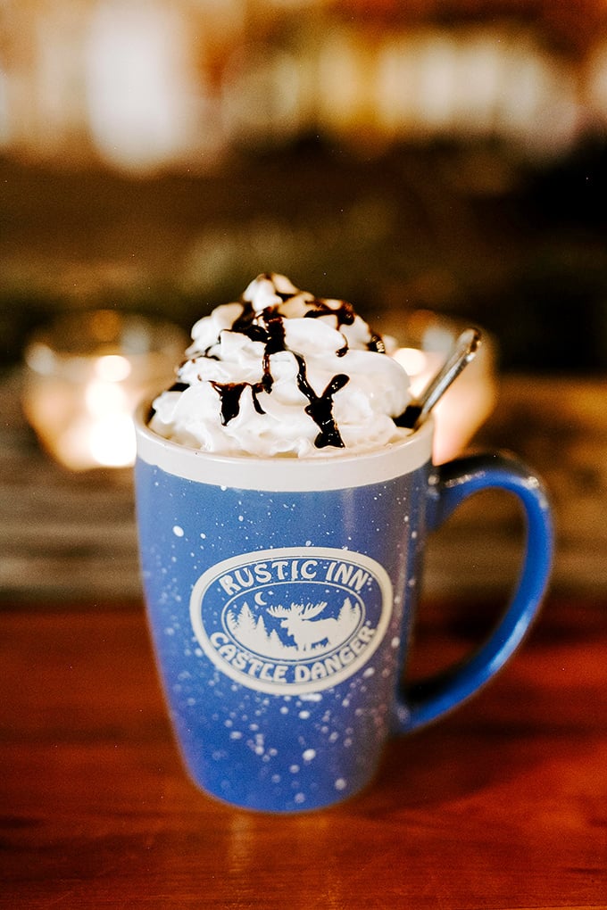 Hot cocoa elevated to an art form, topped with a cloud of whipped cream. The perfect hand-warmer after a day of North Shore adventures.